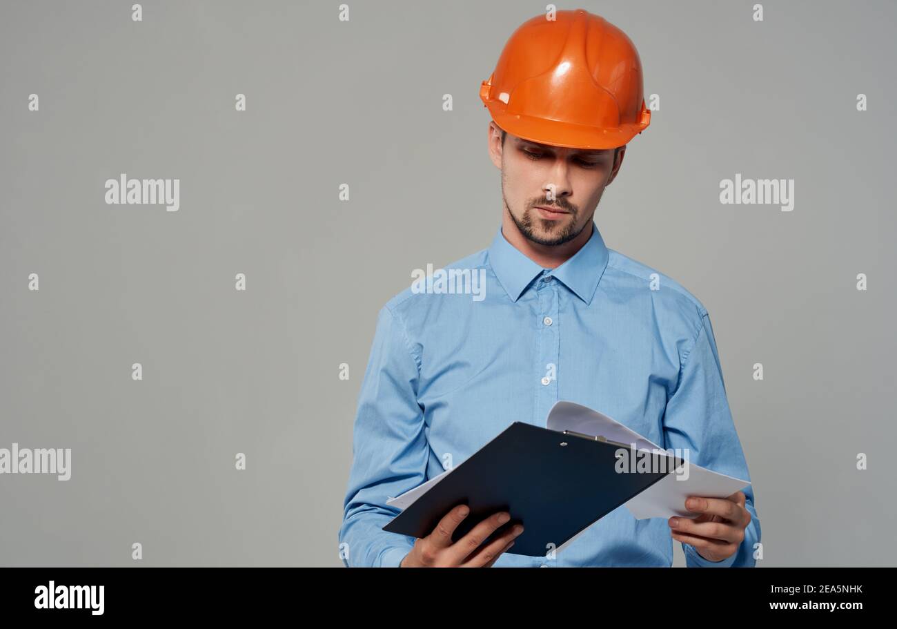 civil engineer architecture man in orange helmet Stock Photo - Alamy