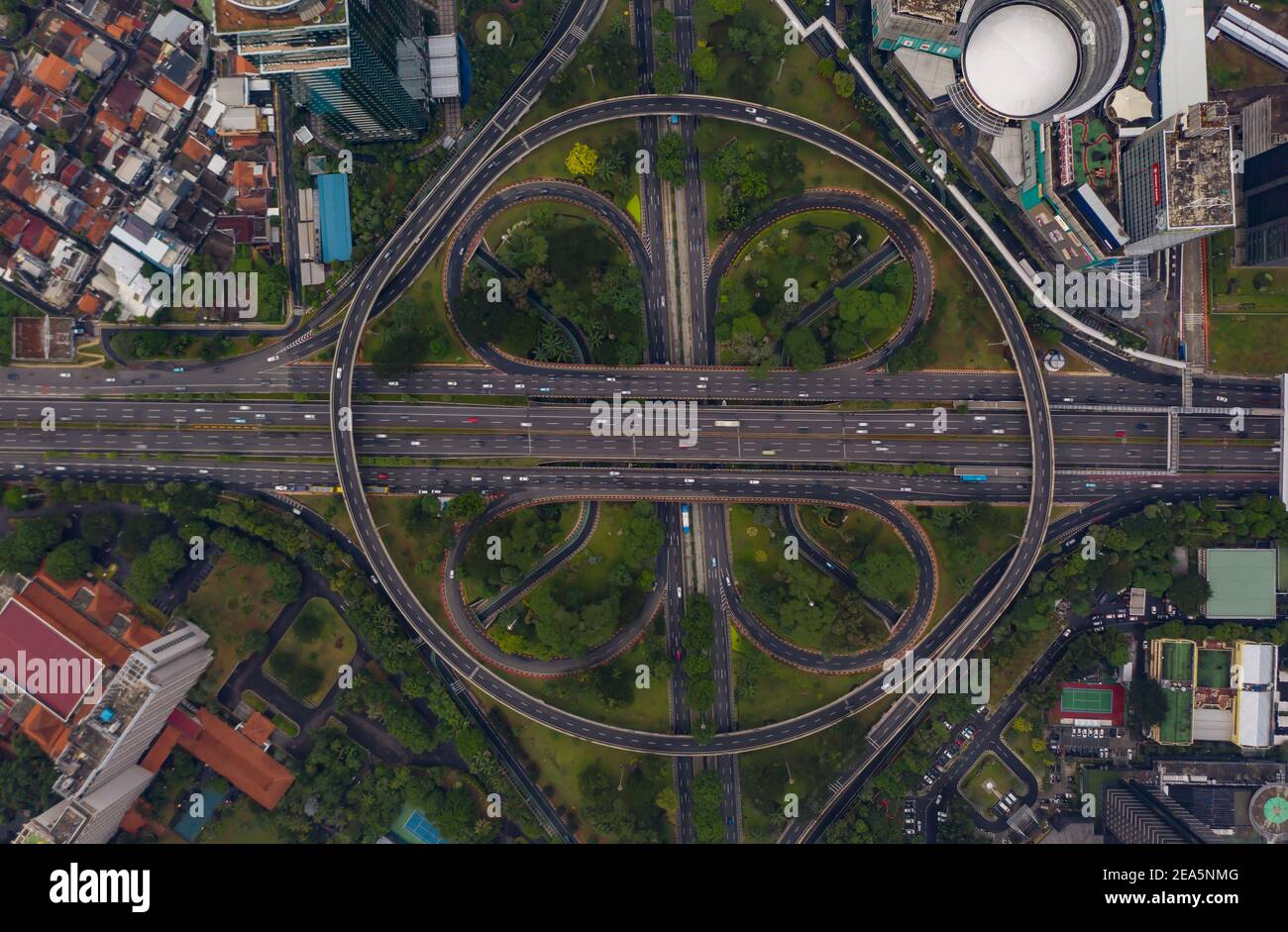 Top down overhead aerial view of large multi lane roundabout in Jakarta ...