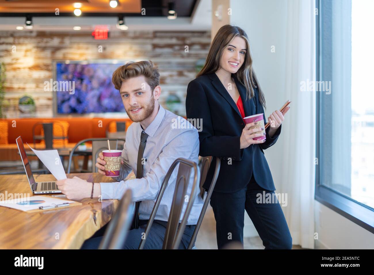 Office employee having a meeting with their team Stock Photo - Alamy