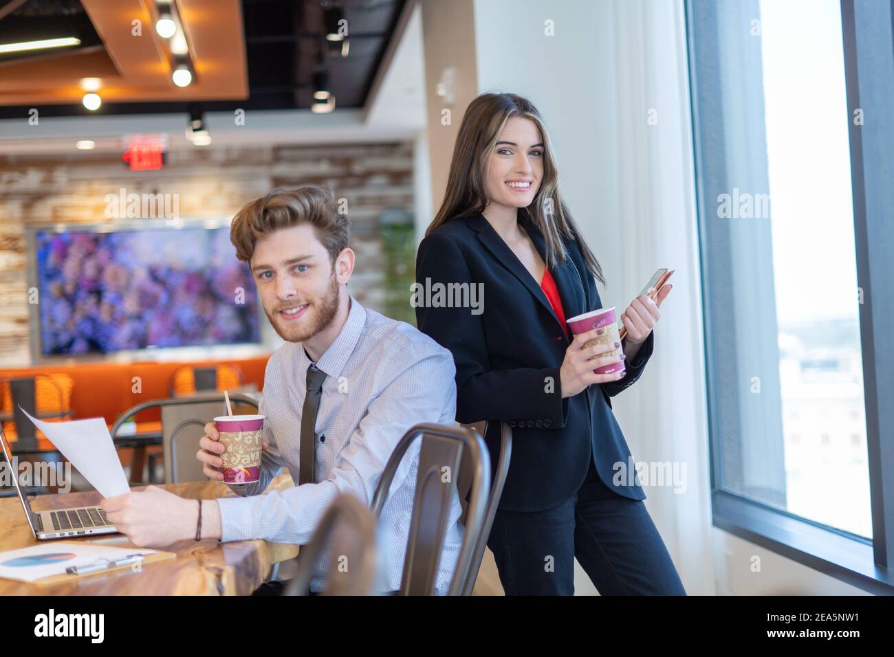 Office employee having a meeting with their team Stock Photo - Alamy
