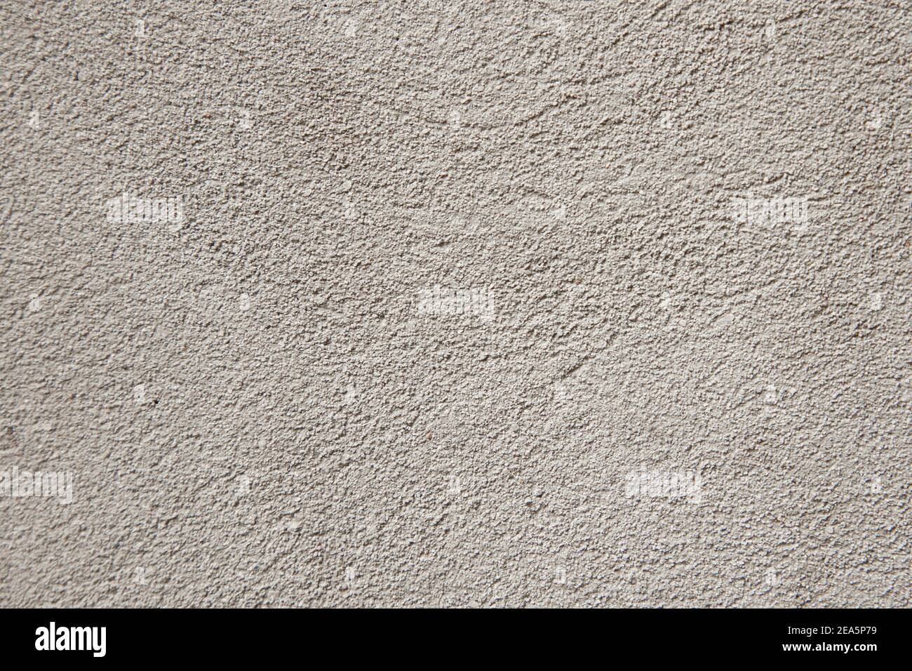 A concrete light-grey photo texture pattern. Stone wall background ...
