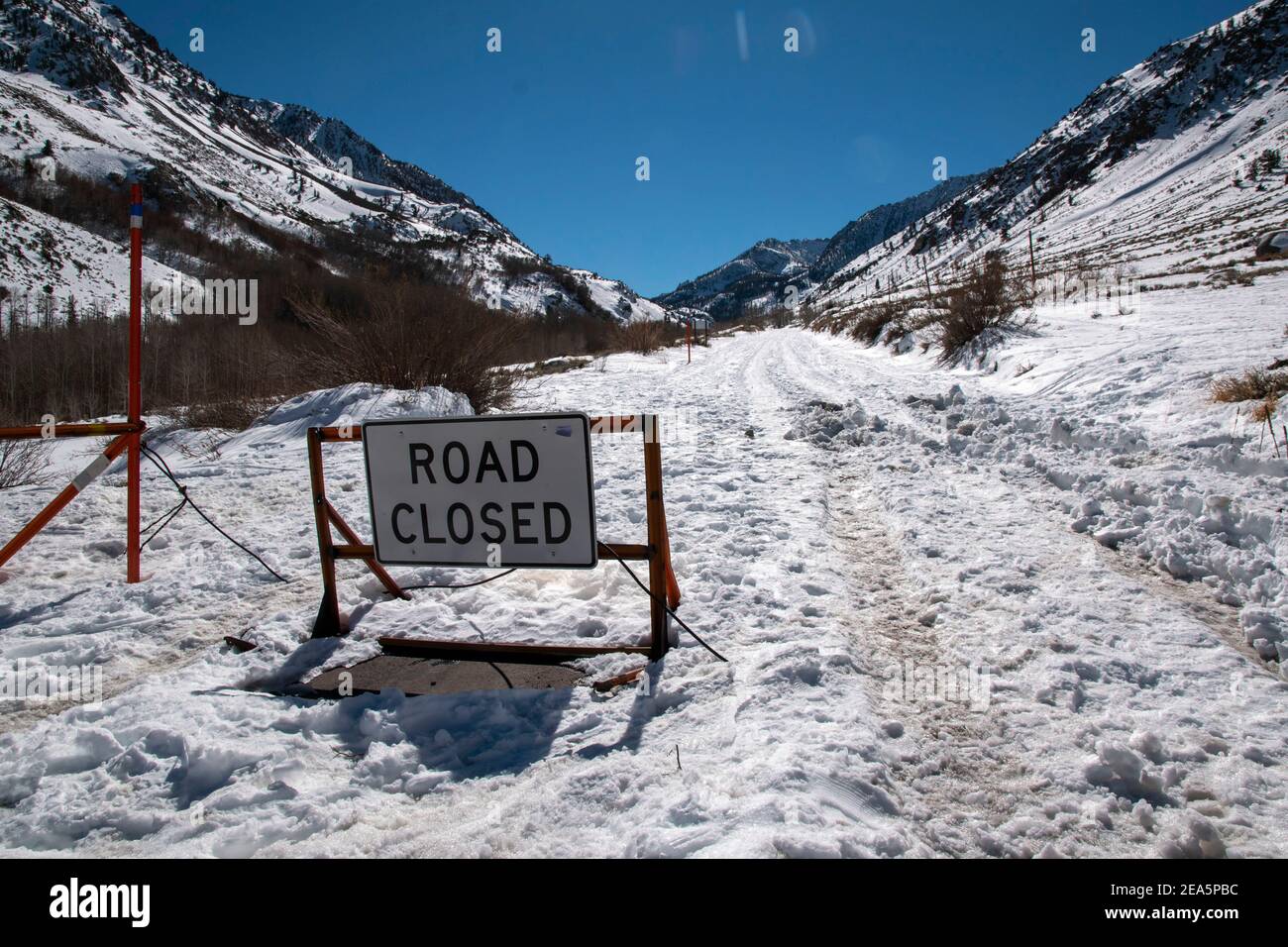 The road past South Fork Bishop Creek in Inyo County, CA is covered ...