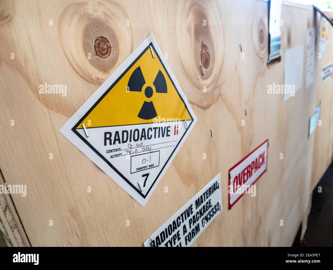 The radioactive material label beside the transportation wooden box ...