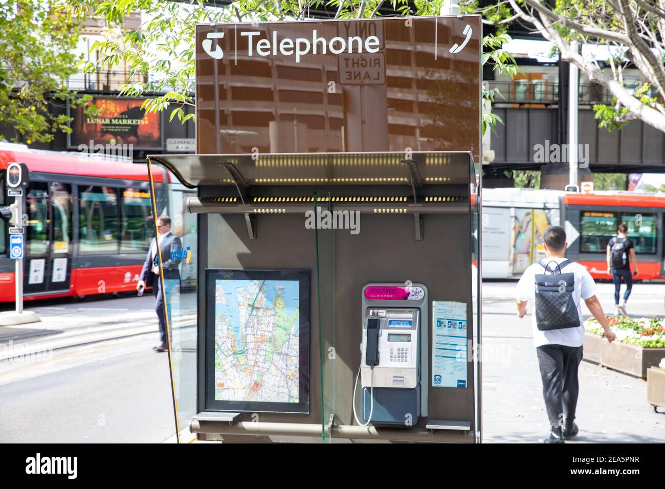Traditional Telstra public phone booth payphone using landline ...
