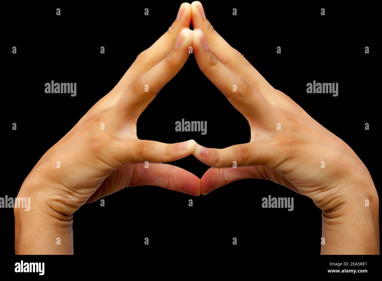 Shot of a human doing Hakini mudra isolated black background Stock ...