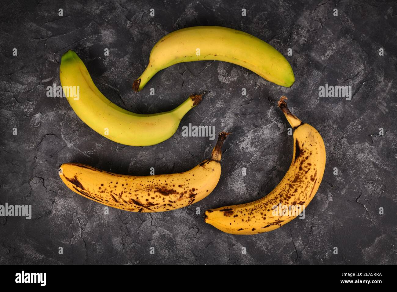 Comparison of ripe bananas with black patches and slightly green ...