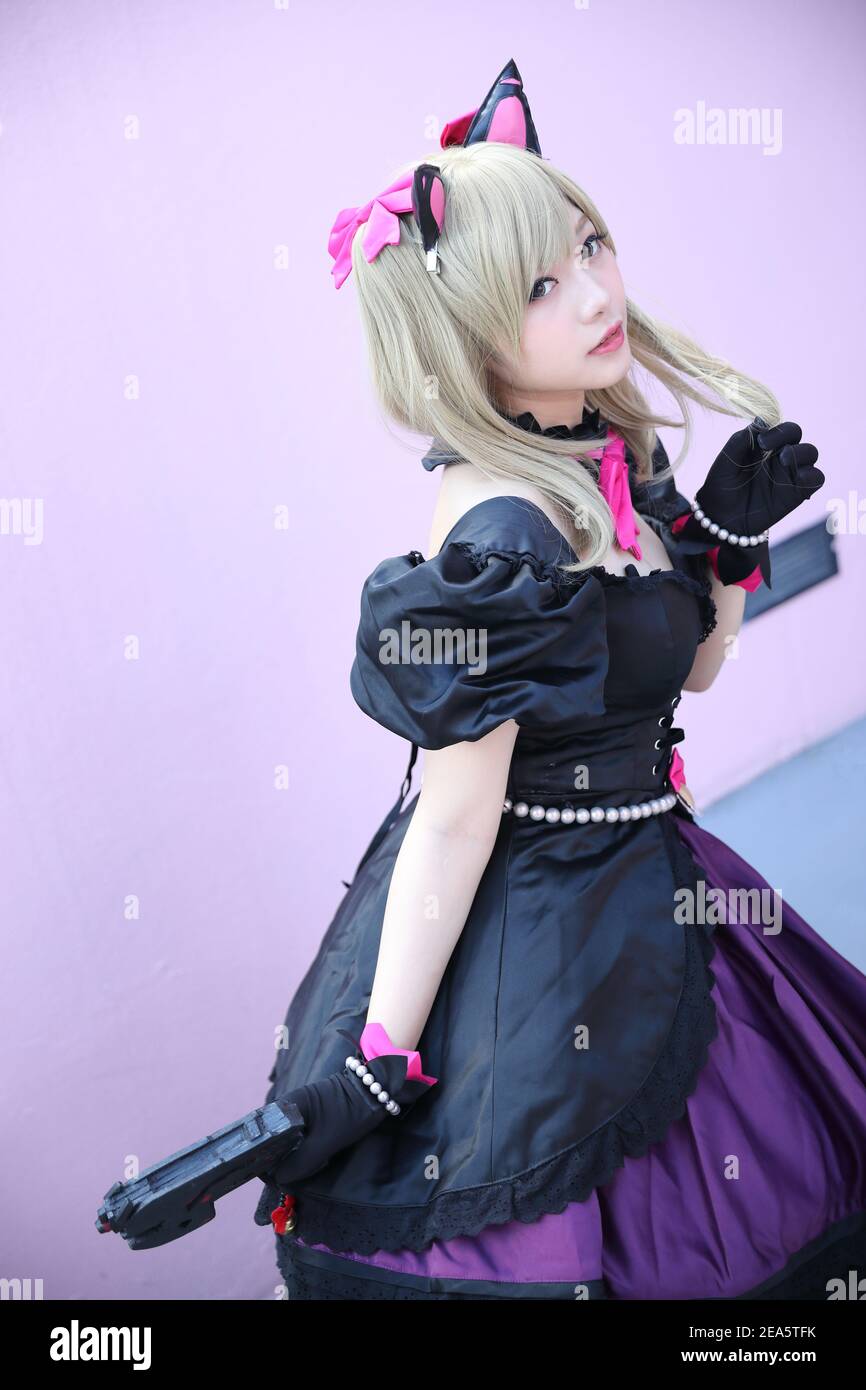 Japan anime cosplay , portrait of girl cosplay in pink room background ...