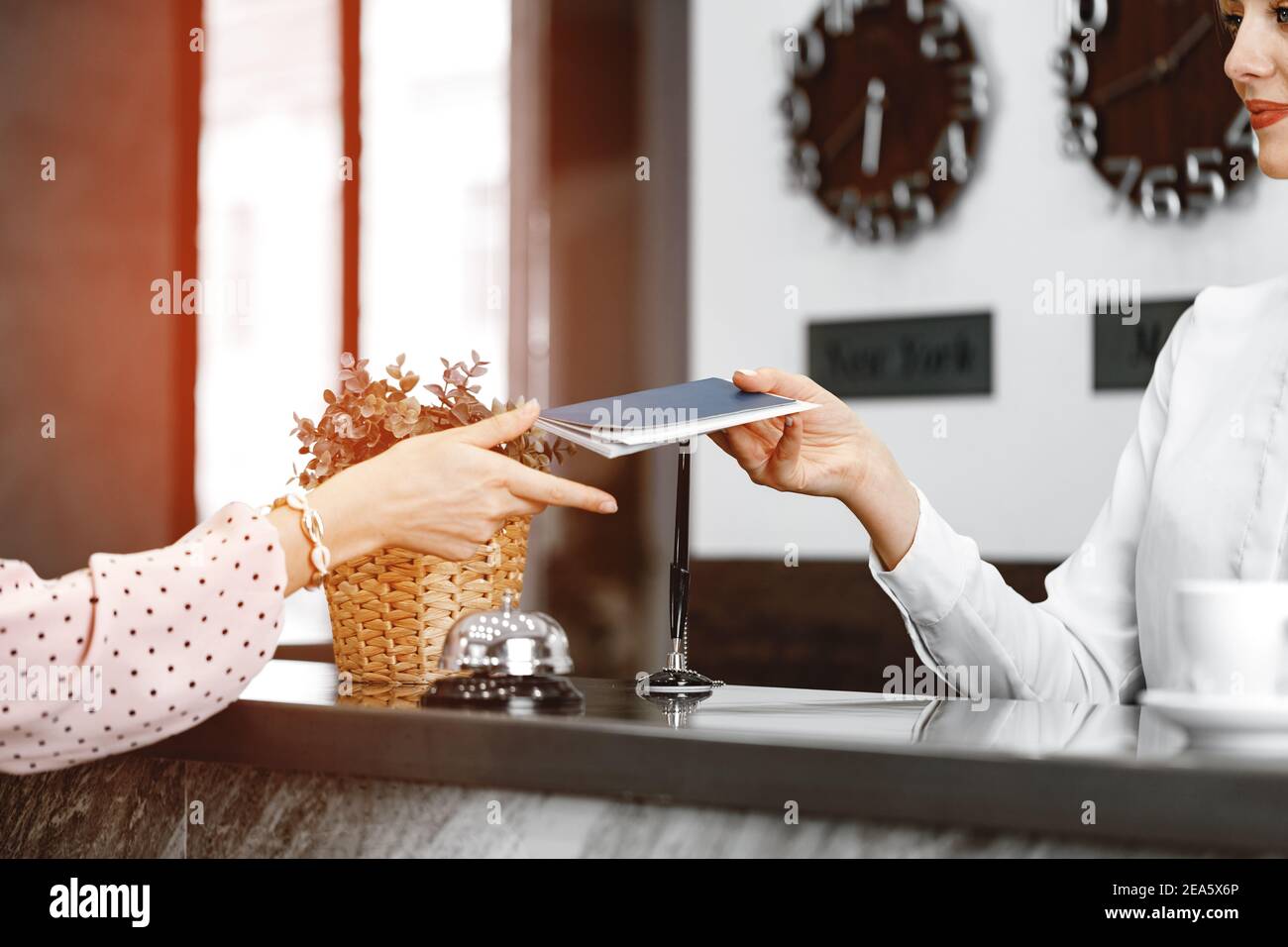 Passport hotel reception hi-res stock photography and images - Alamy