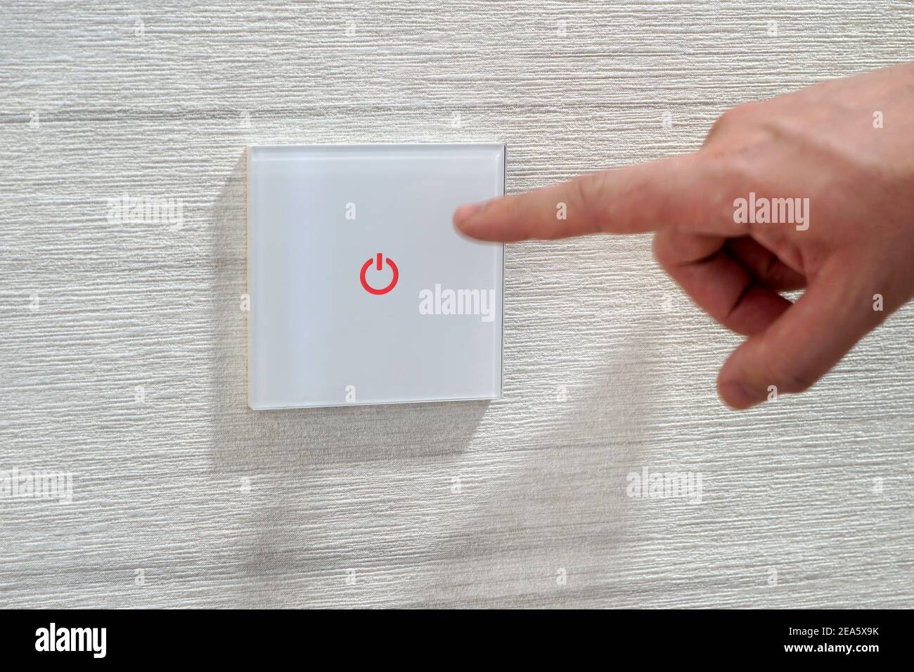 save energy concept, closeup of finger touching to electric switch. a ...