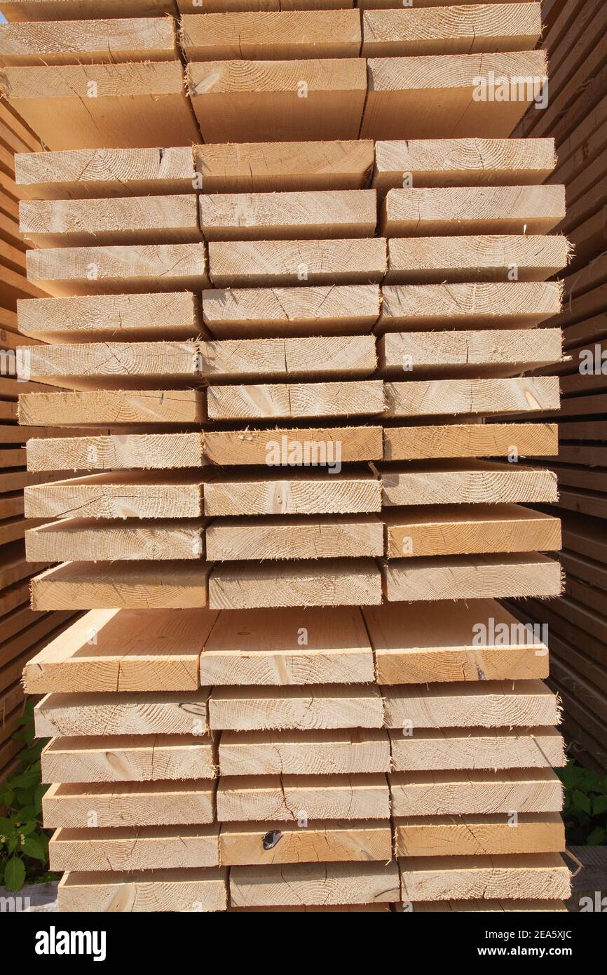 Stack of new wooden studs at the lumber yard Stock Photo - Alamy