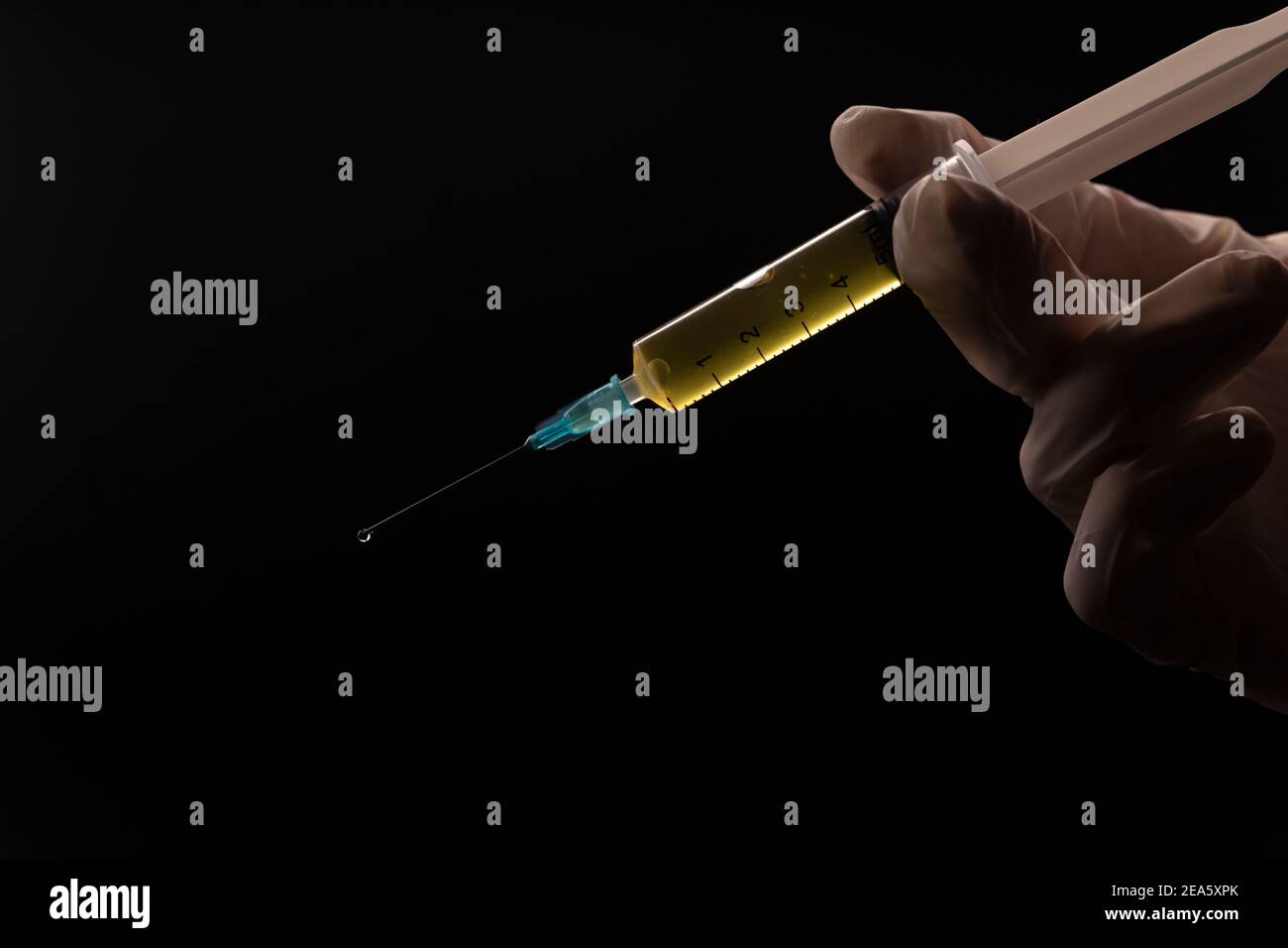 selective focus. a single-use syringe with a vaccine, a serum from the ...