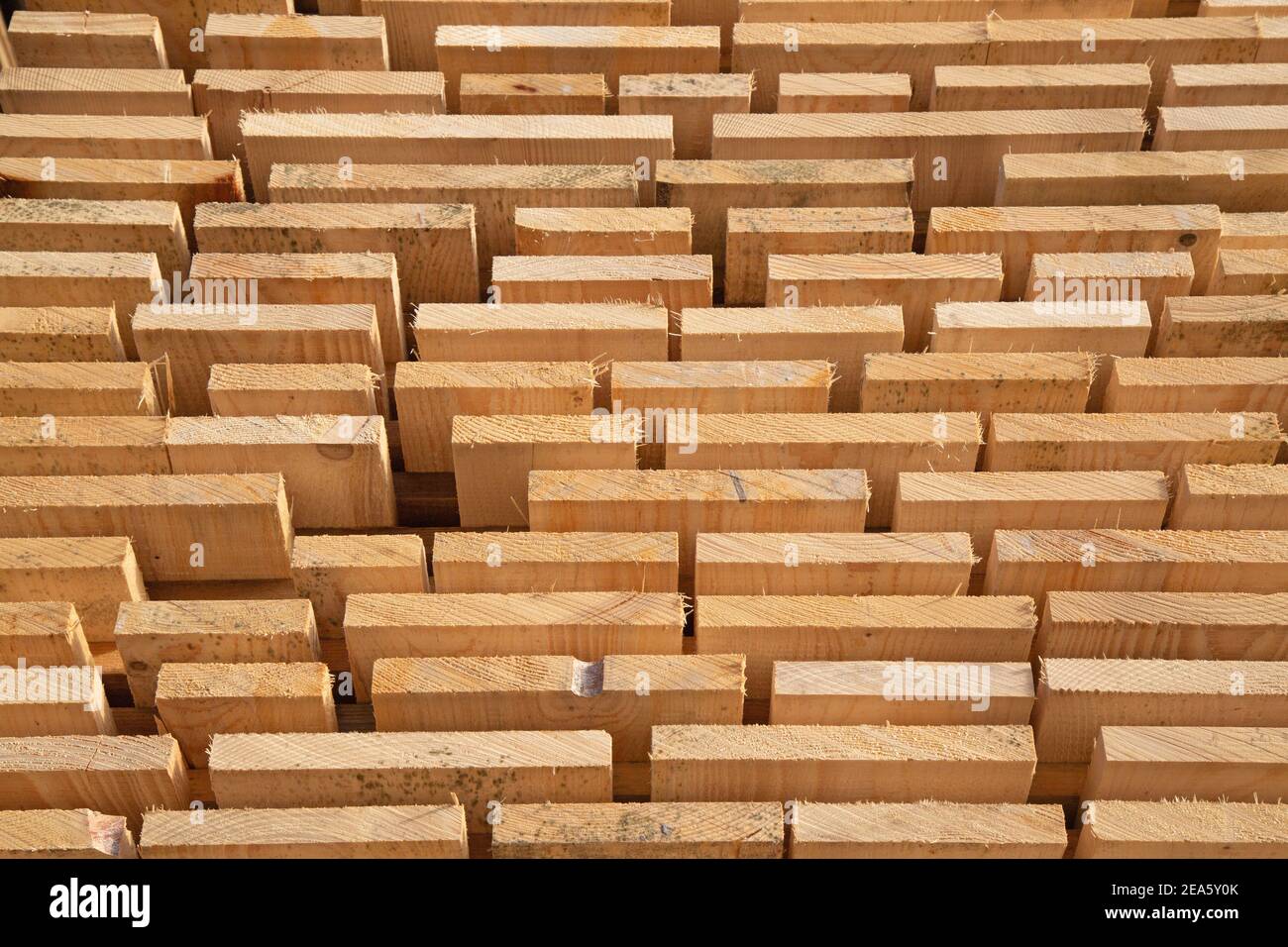 Stack of new wooden studs at the lumber yard Stock Photo - Alamy