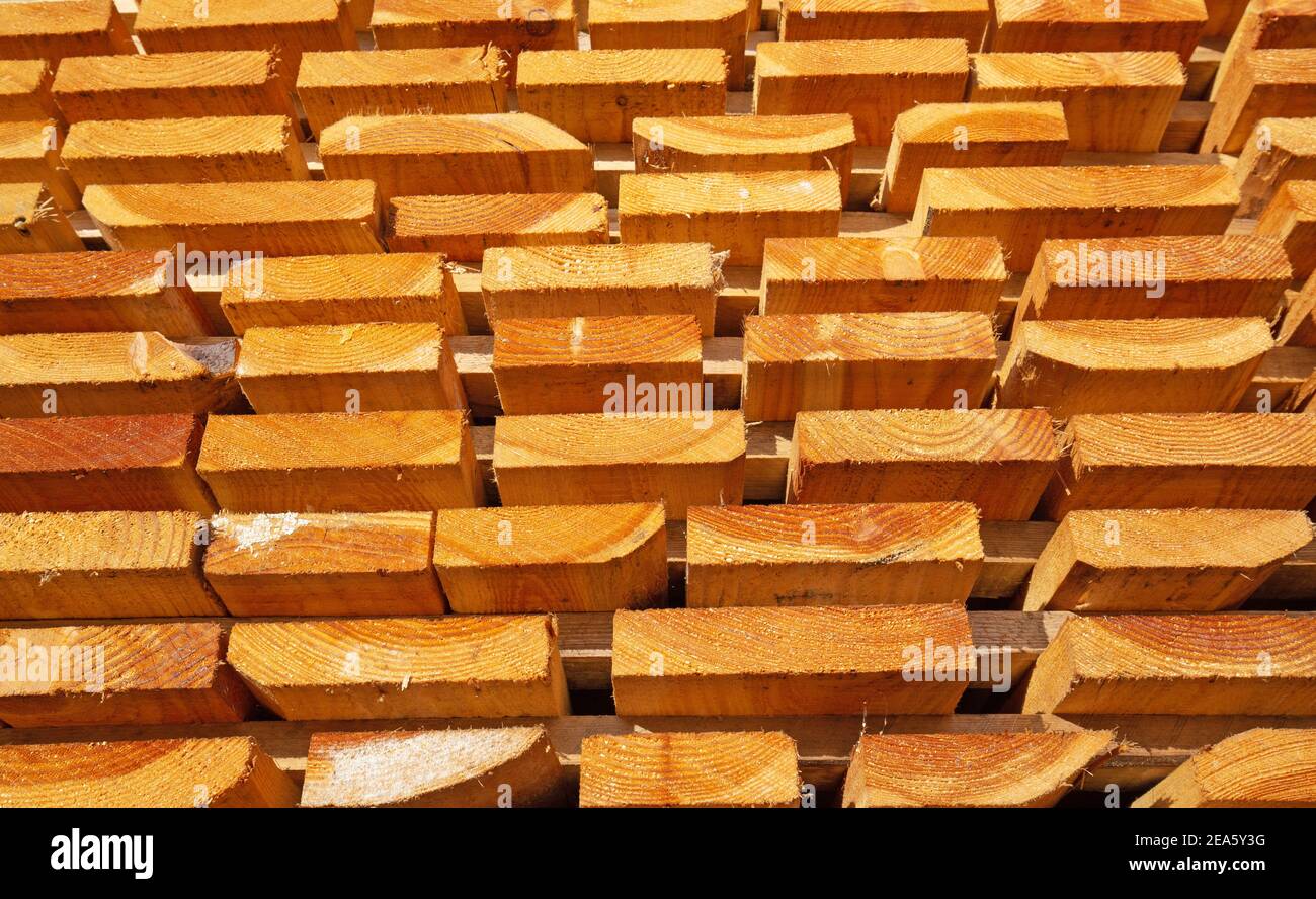 Stack of new wooden studs at the lumber yard Stock Photo - Alamy