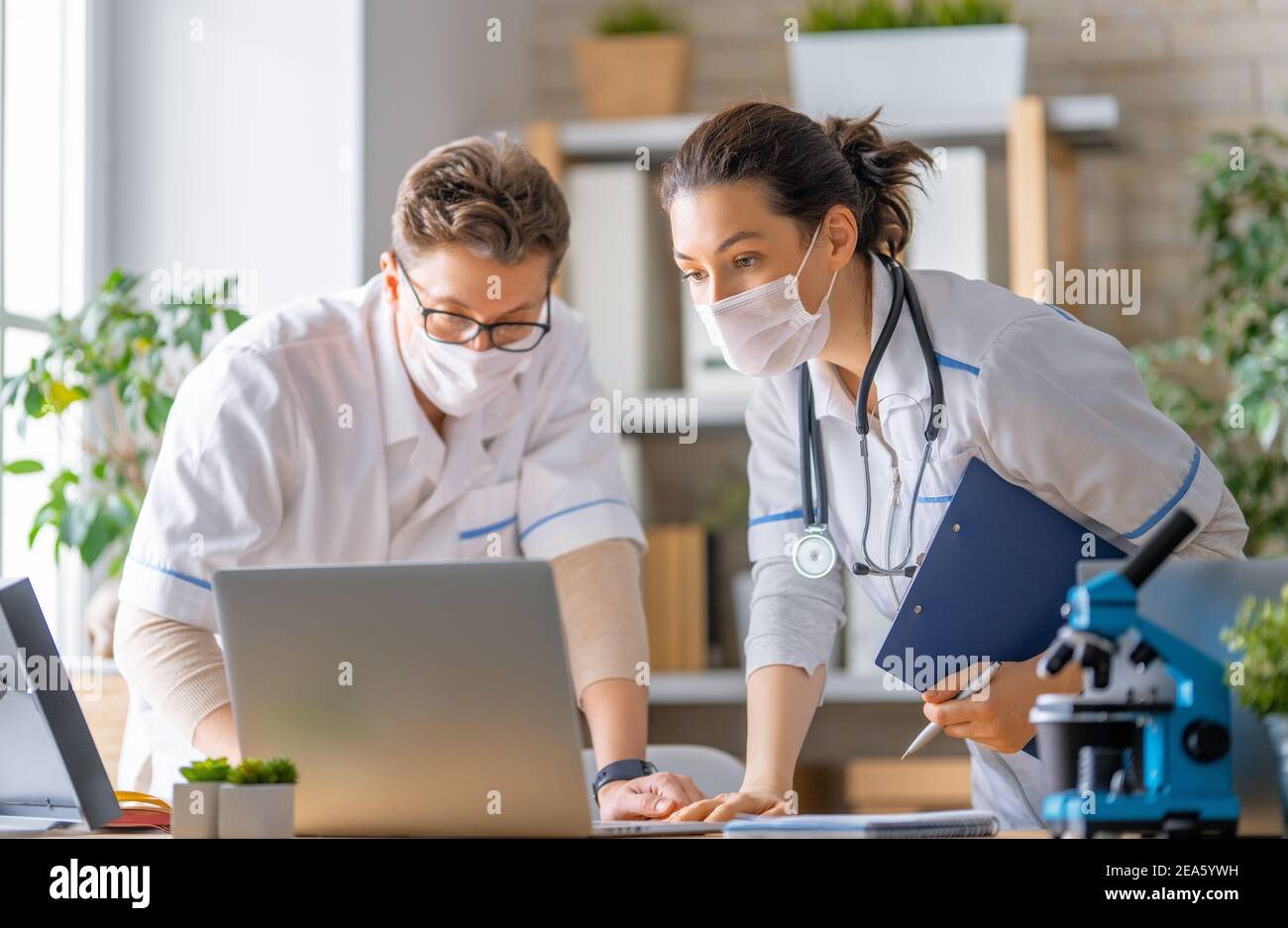 Doctors are talking. People are working in medical office Stock Photo ...