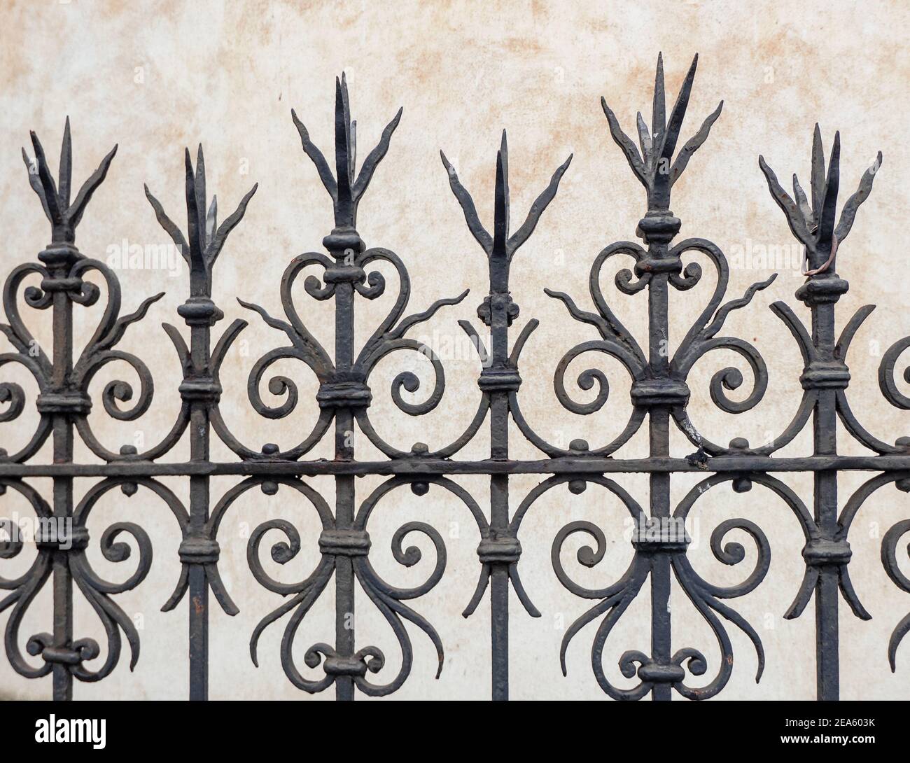 ancient iron gate surrounds a religious building Stock Photo - Alamy