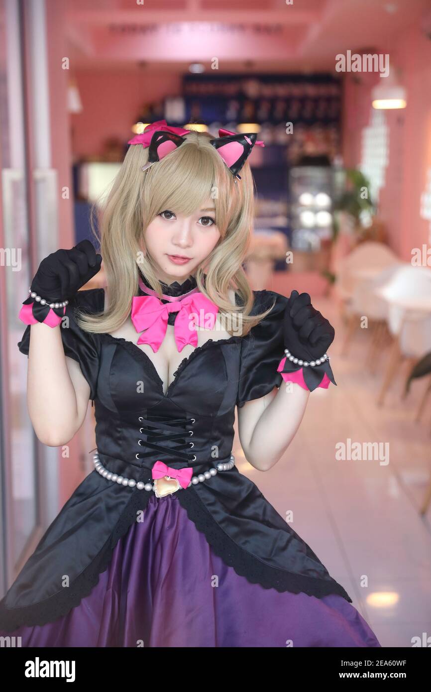 Japan anime cosplay , portrait of girl cosplay in pink room background ...