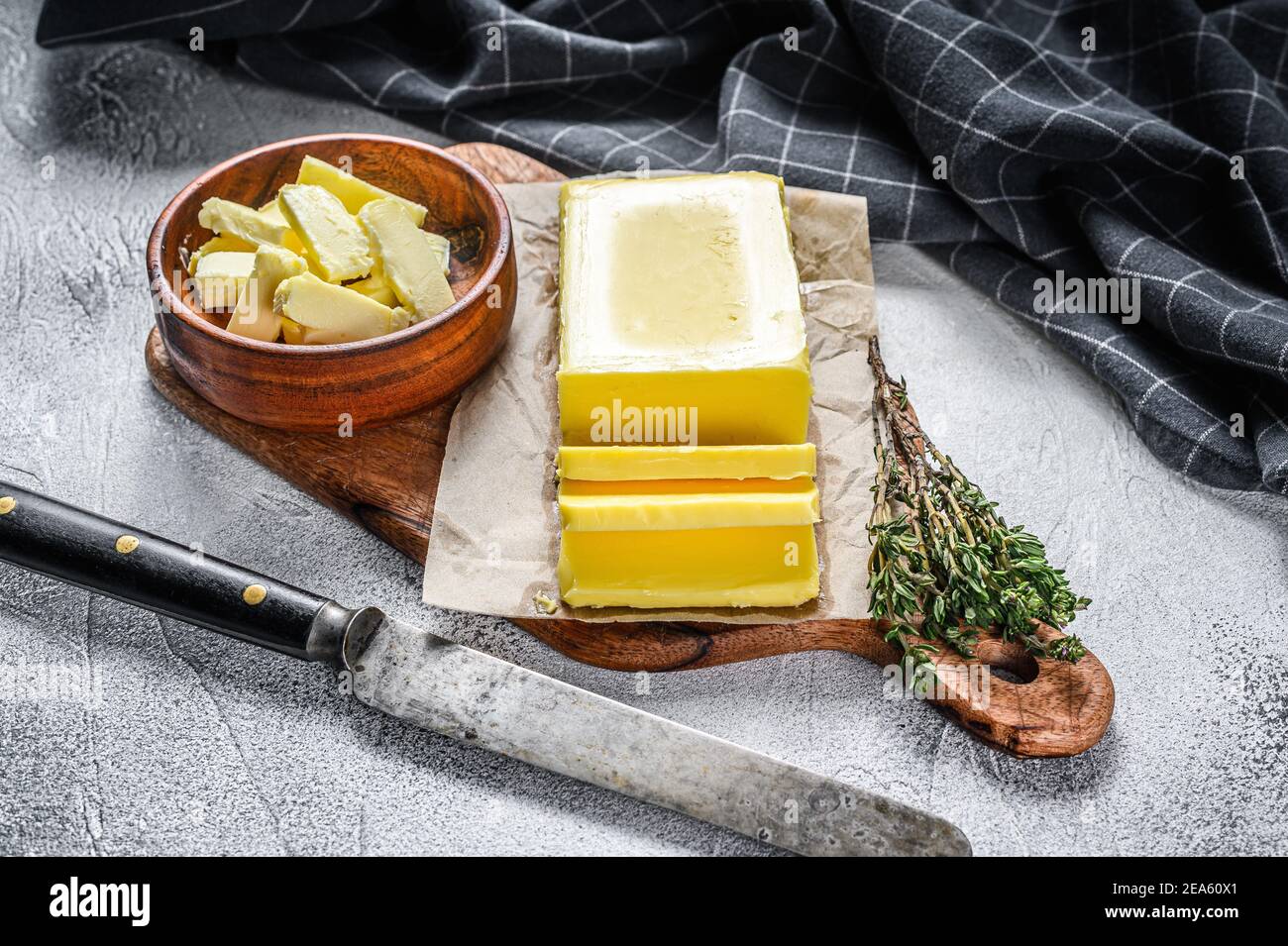 Block of fresh Butter, dairy farm products. Gray background.Top view ...