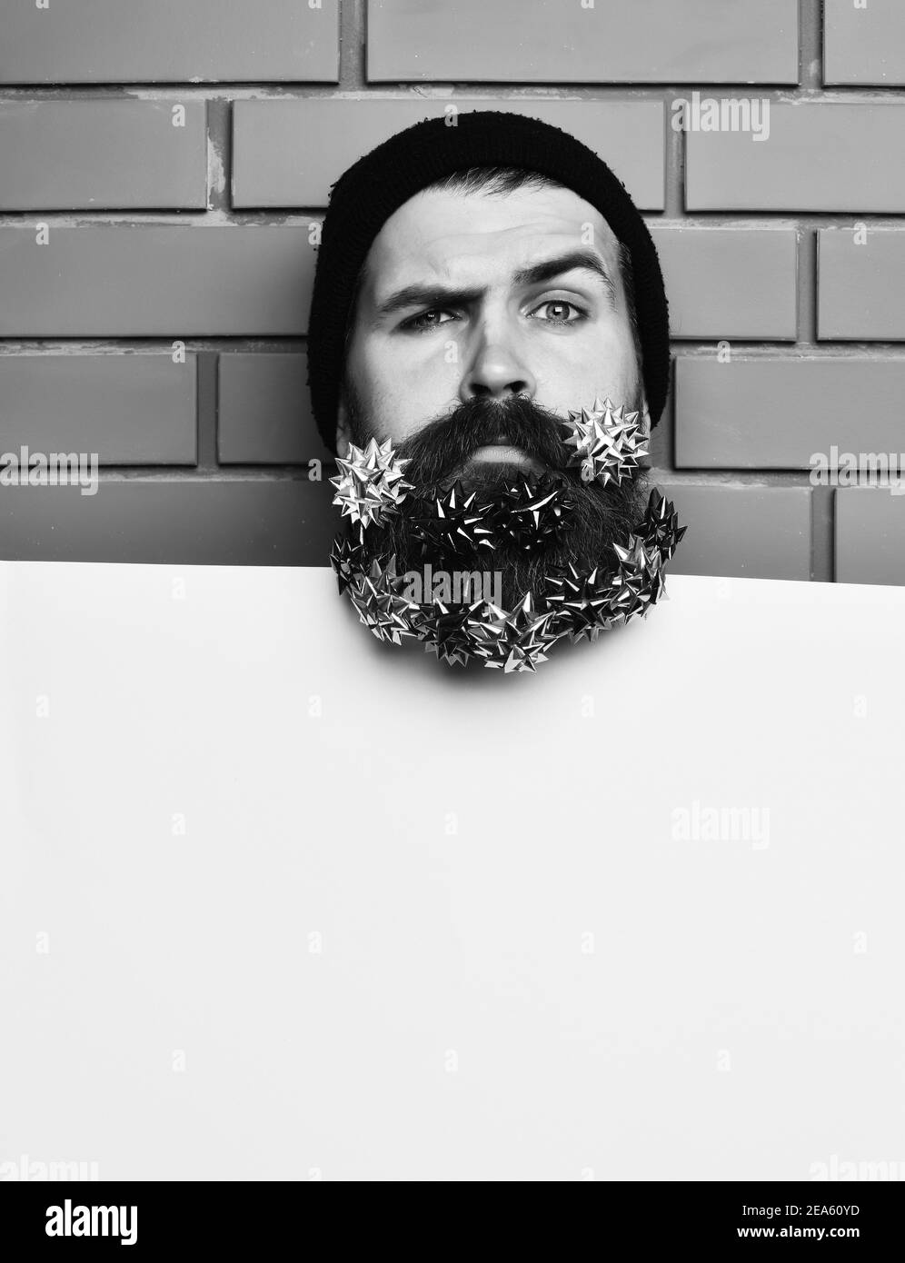 Bearded man, long beard. Brutal caucasian squinting hipster with ...