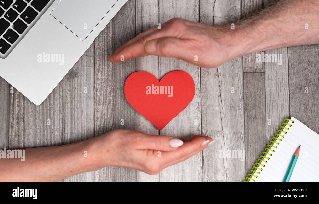 Hands protecting heart cardio hi-res stock photography and images - Alamy