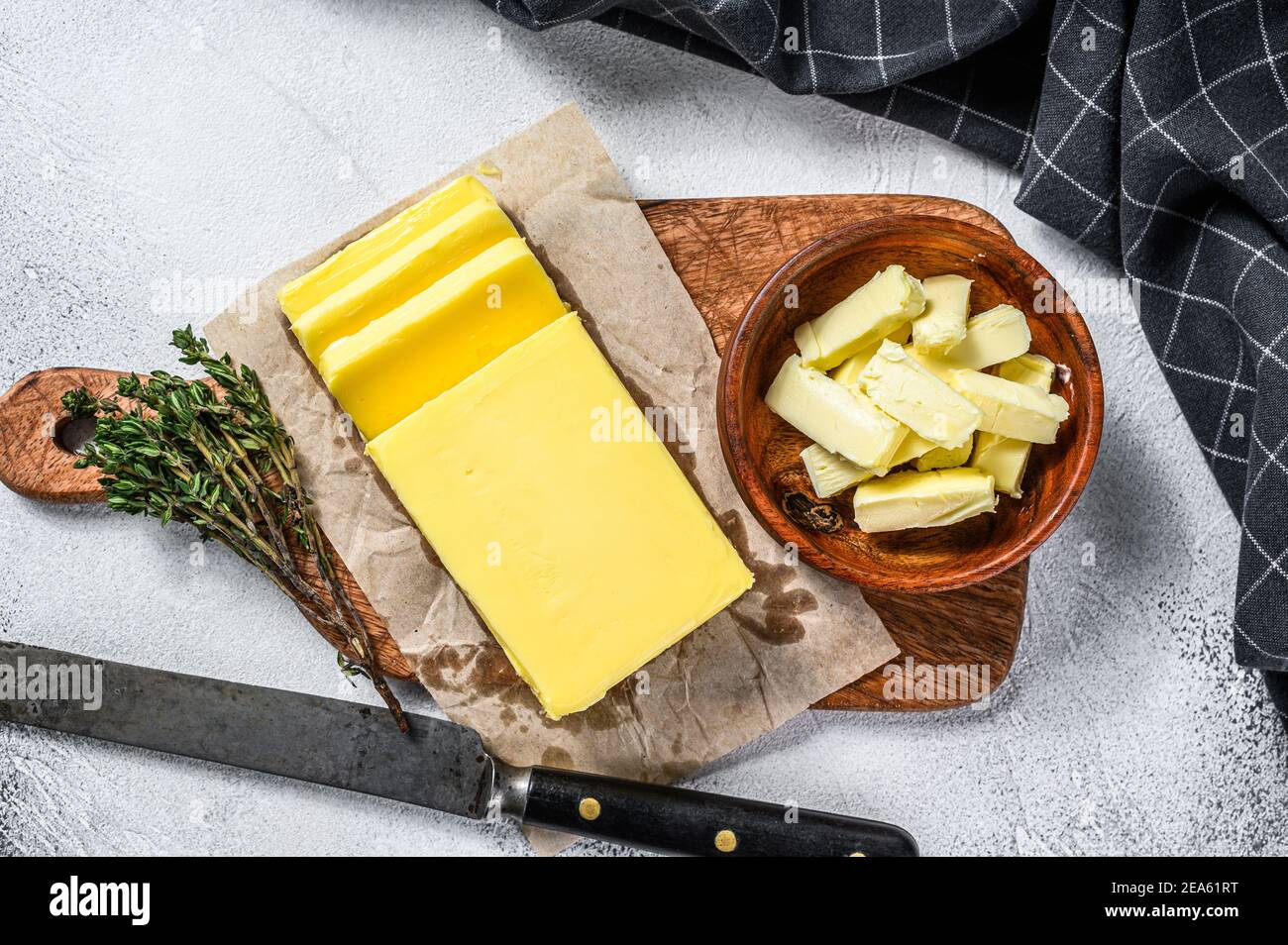 Block of fresh Butter, dairy farm products. Gray background.Top view ...