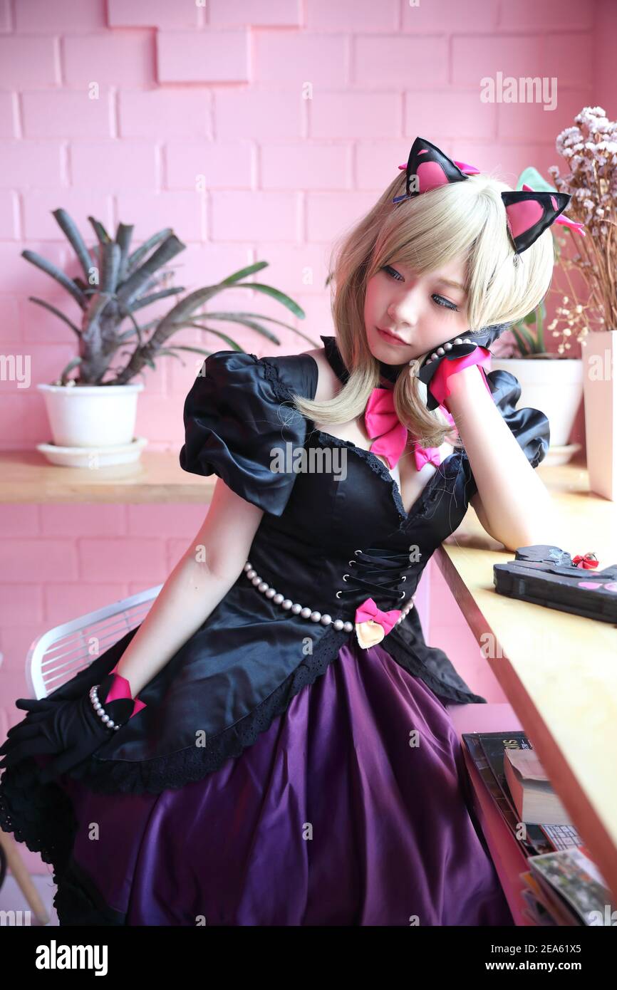 Japan anime cosplay , portrait of girl cosplay in pink room background ...