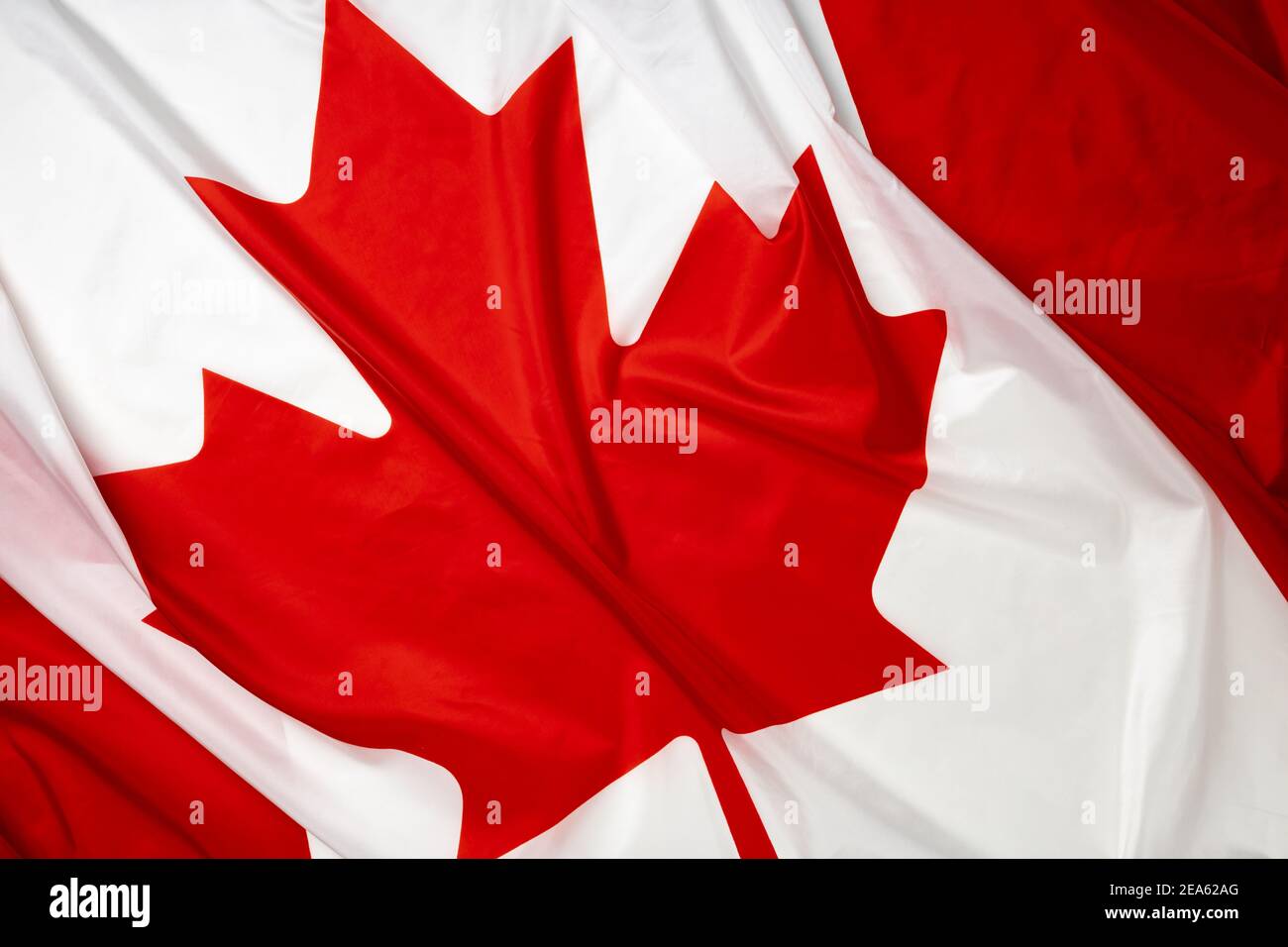 Rippled textile flag of Canada close up Stock Photo - Alamy