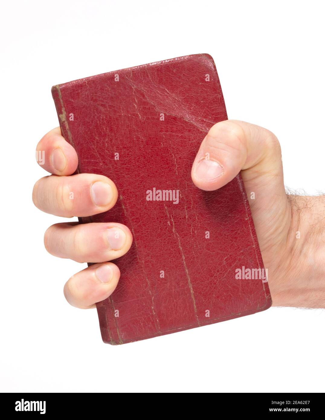 Hand holding the old bible, strong grab, isolated on white Stock Photo ...