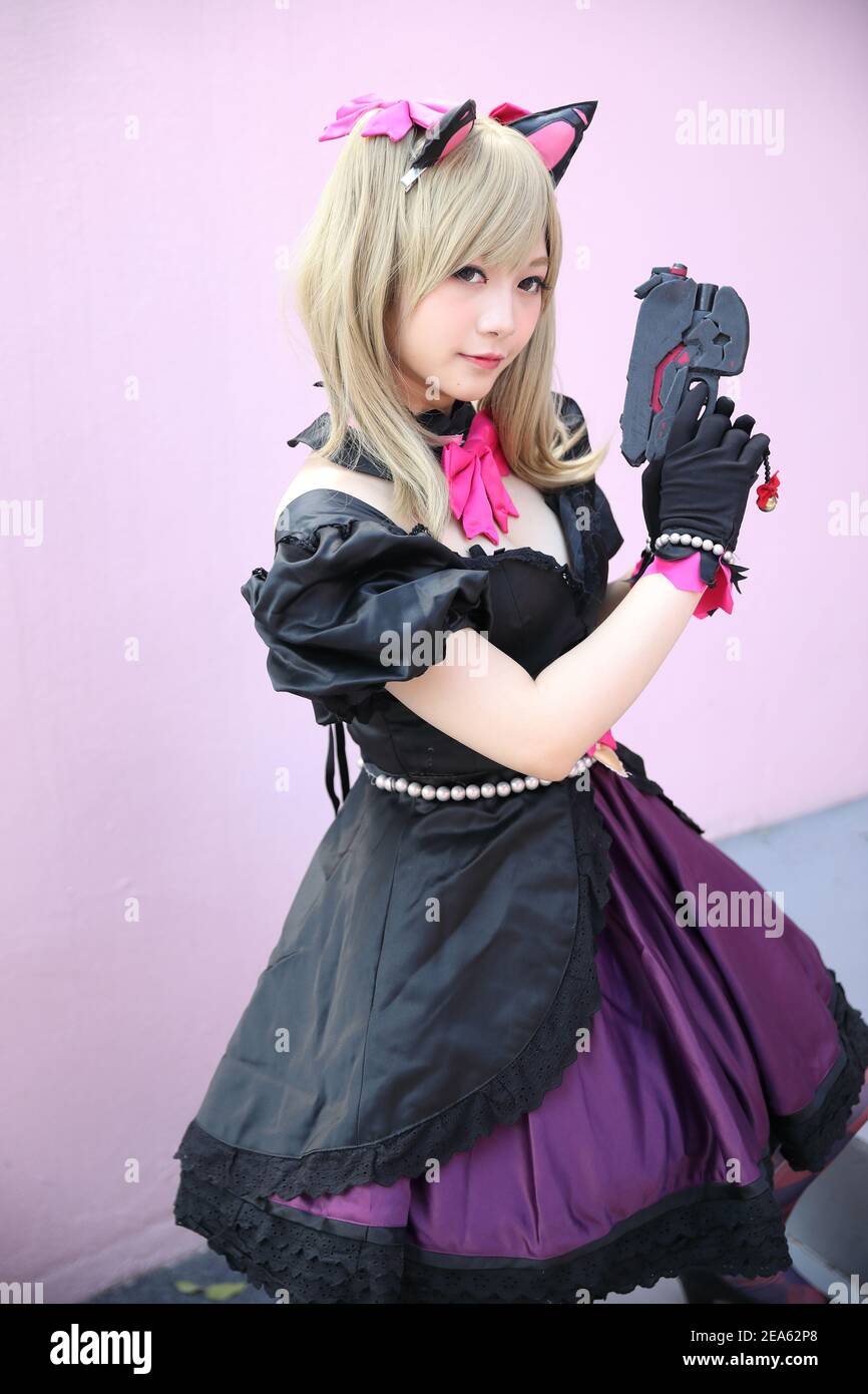 Japan anime cosplay , portrait of girl cosplay in pink room background ...