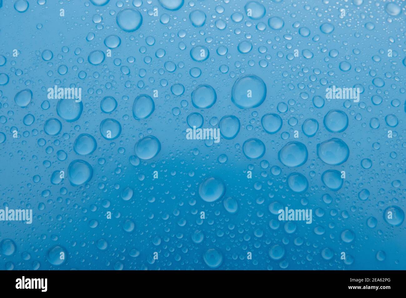 Condensation bubbles behind blue plastic 0331 Stock Photo - Alamy