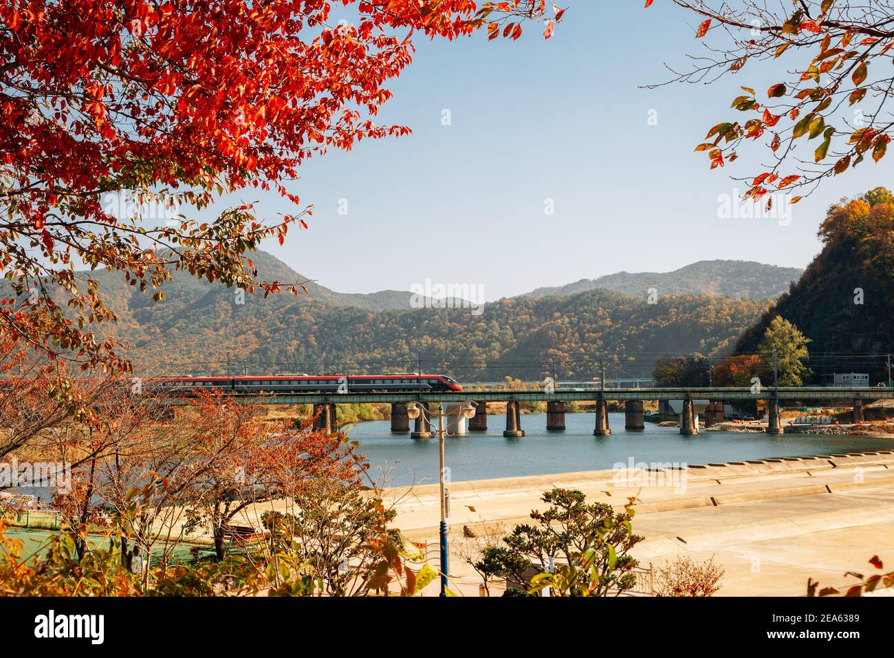 Railroad with Miryang river and mountain at autumn in Miryang, Korea ...