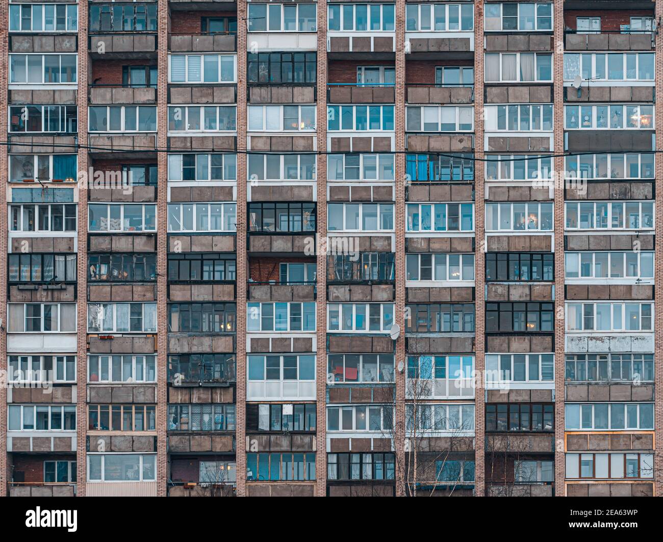 Balconies on a soviet era building. Old apartment building. Front view ...