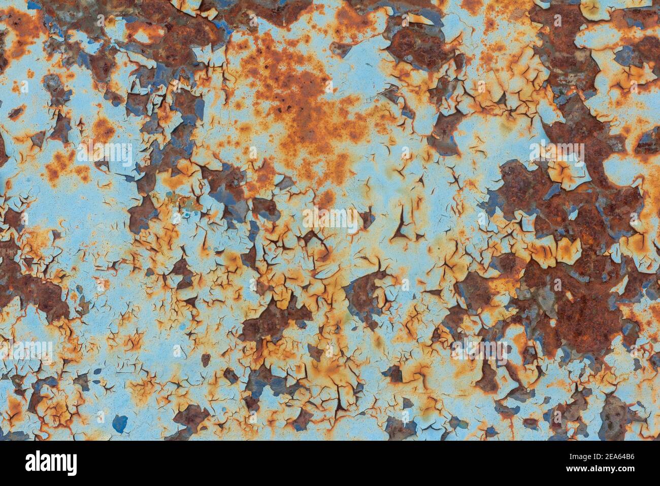 An old blue painted wall with spots and streaks of rust.Rusty metal ...