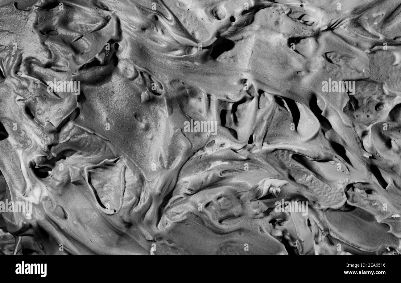 Gray rough surface brutal texture putty foam background with bulky ...