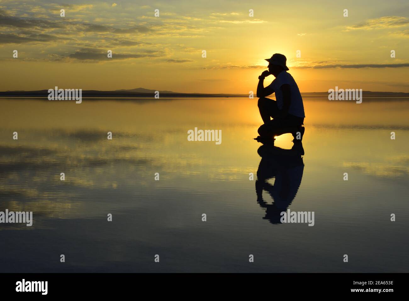 sunset meditation and reflection Stock Photo - Alamy
