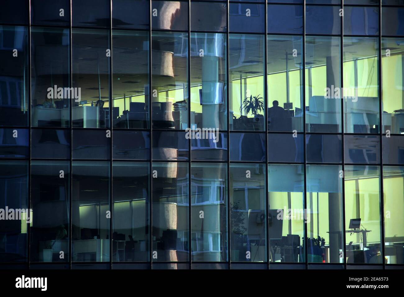 Workplaces Without Workers Behind Windows Of Office Center Stock Photo ...