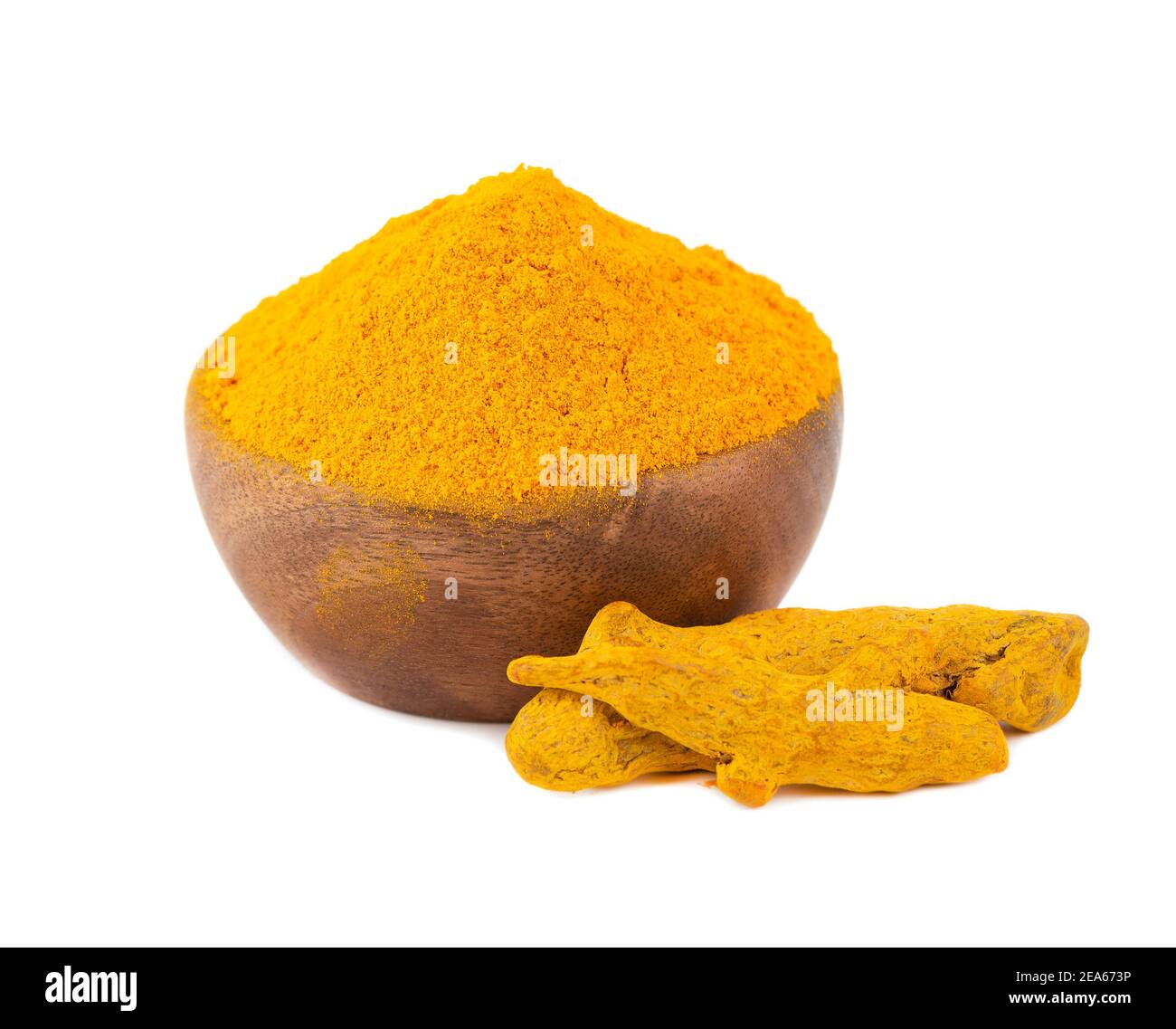 Dry turmeric powder in wooden bowl, isolated on white background ...
