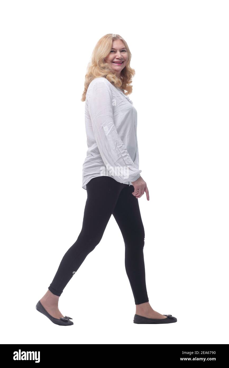 side view. woman in comfortable clothing striding forward Stock Photo ...