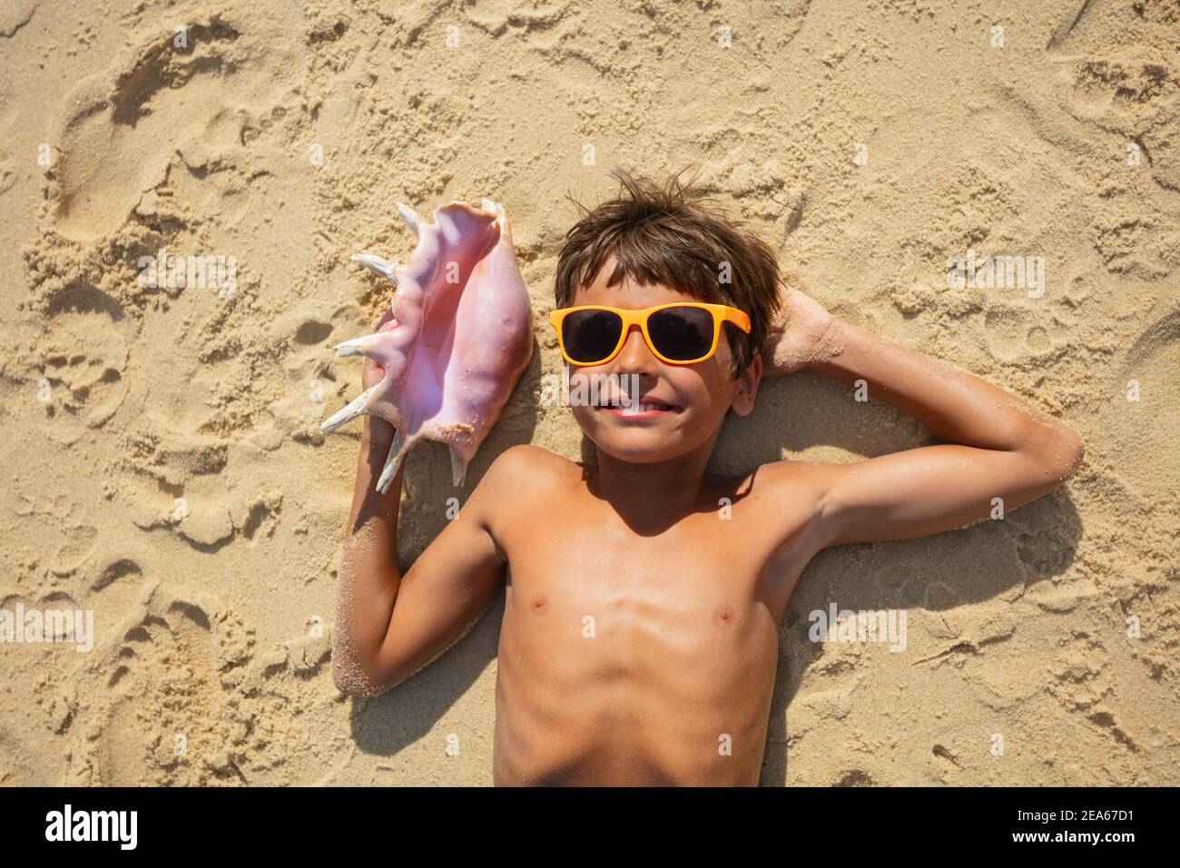 Child shell ear hi-res stock photography and images - Alamy