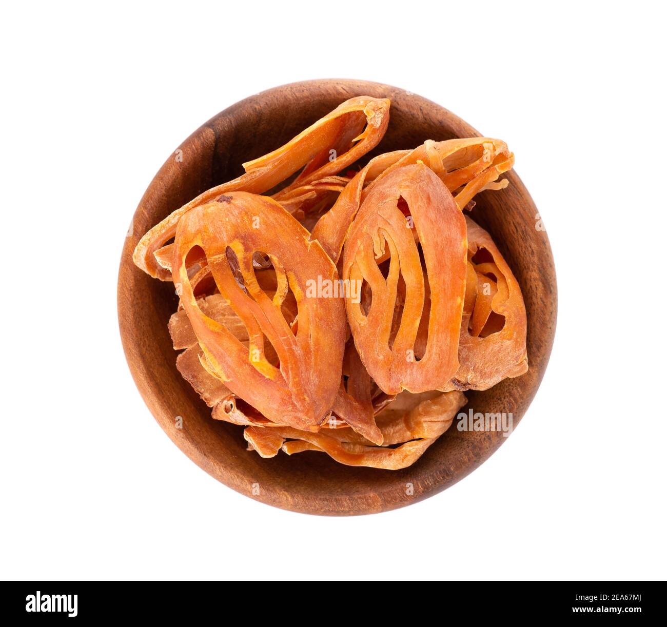 Mace in a wooden bowl, isolated on white background. Nutmeg flower ...