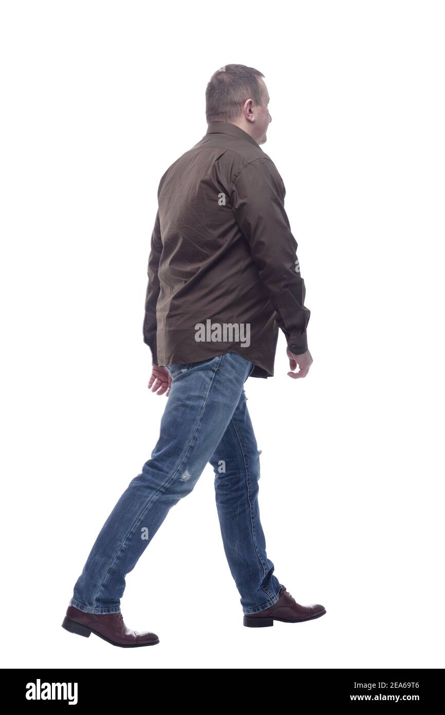 side view. confident adult male striding forward Stock Photo - Alamy