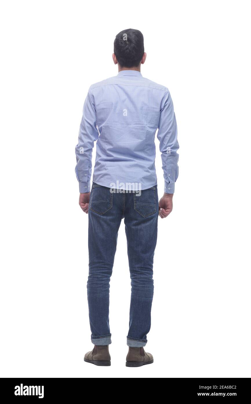 rear view . a young man in jeans looking at a white screen Stock Photo ...