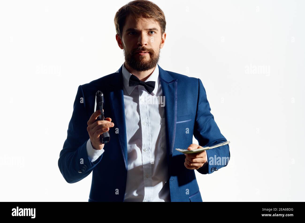 rich man with gun and wad of money classic suit white background Stock ...