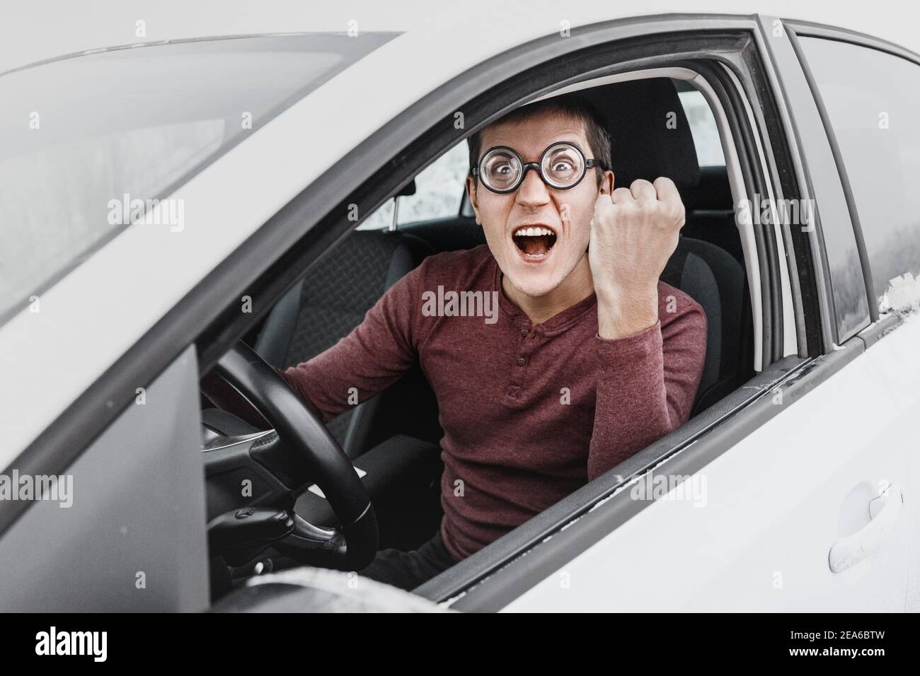 Goofy man driving car hi-res stock photography and images - Alamy