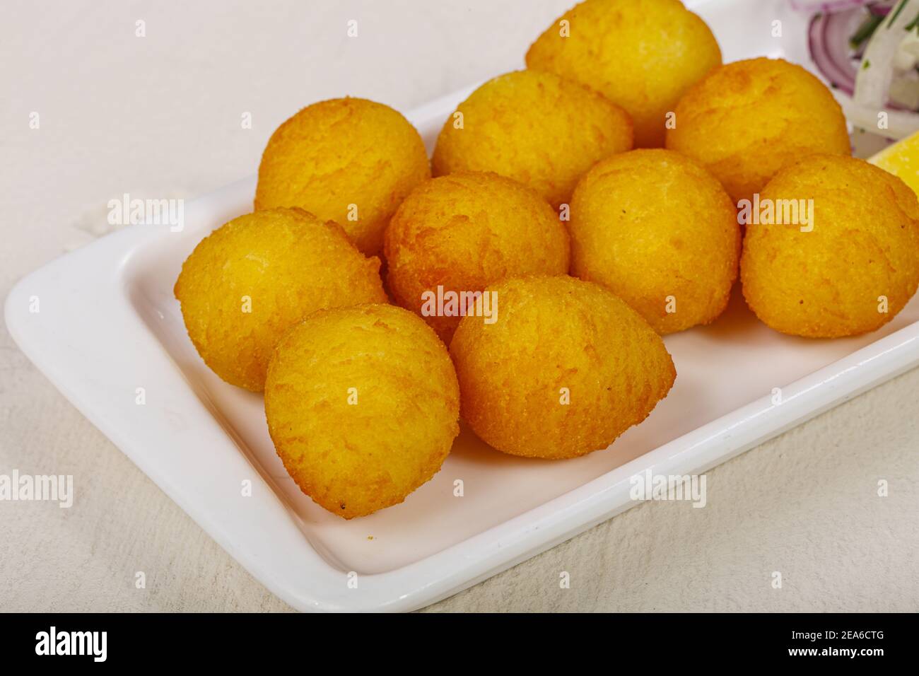 Tasty hot crispy fried potato balls Stock Photo - Alamy