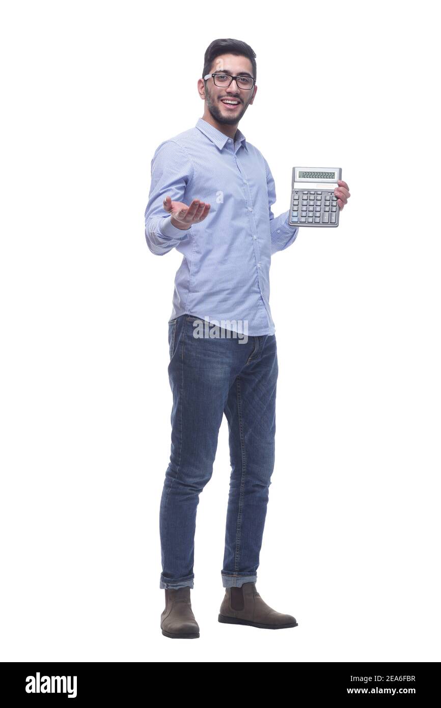in full growth. smart young man with a calculator Stock Photo - Alamy