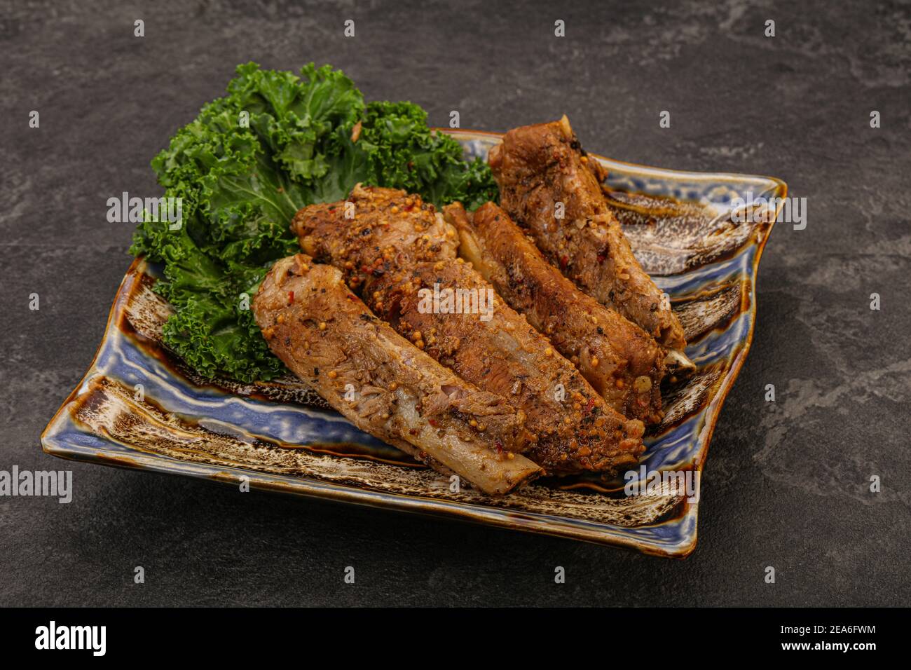 Stewed pork ribs with spices and herbs Stock Photo - Alamy