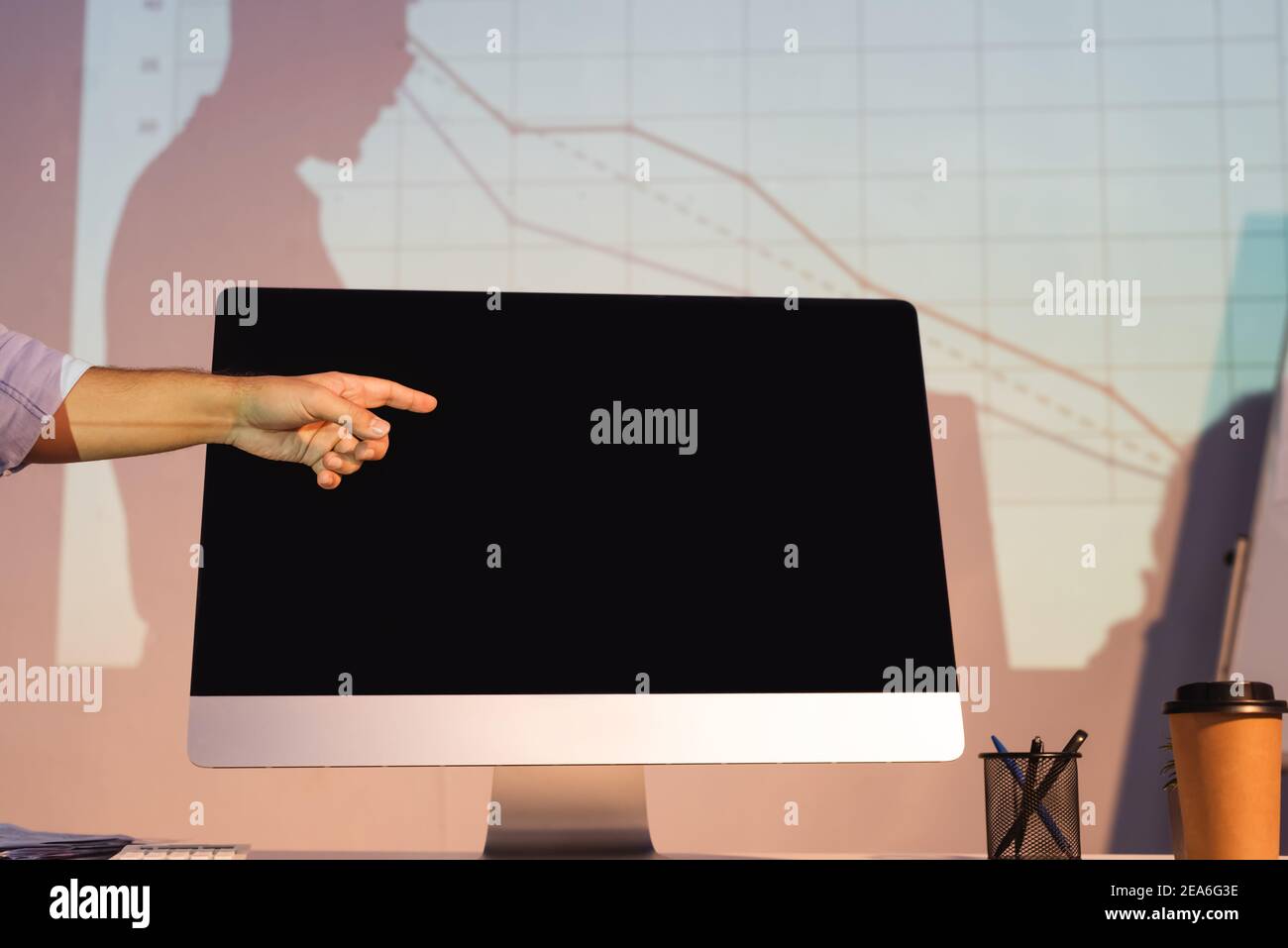 Business people pointing at monitor hi-res stock photography and images ...