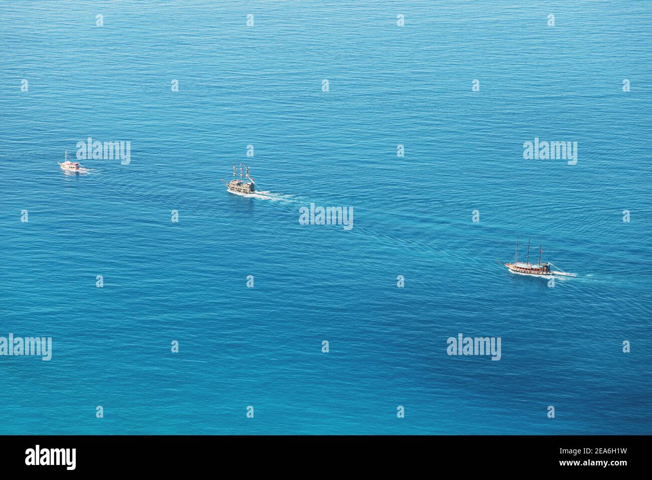 A small fleet of tourist and cruise ships takes passengers to local ...