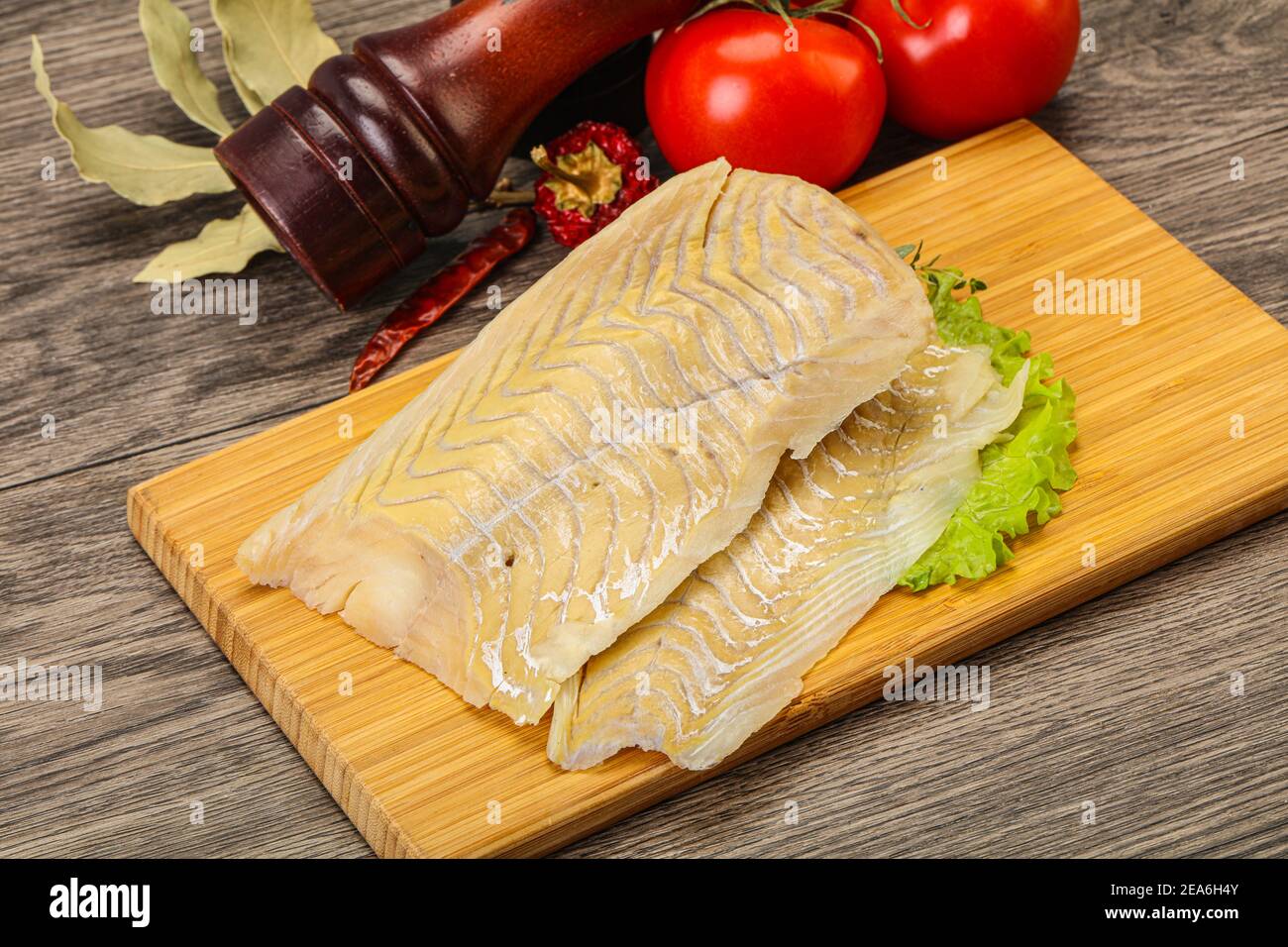 Raw cod fish fillet for cooking Stock Photo - Alamy