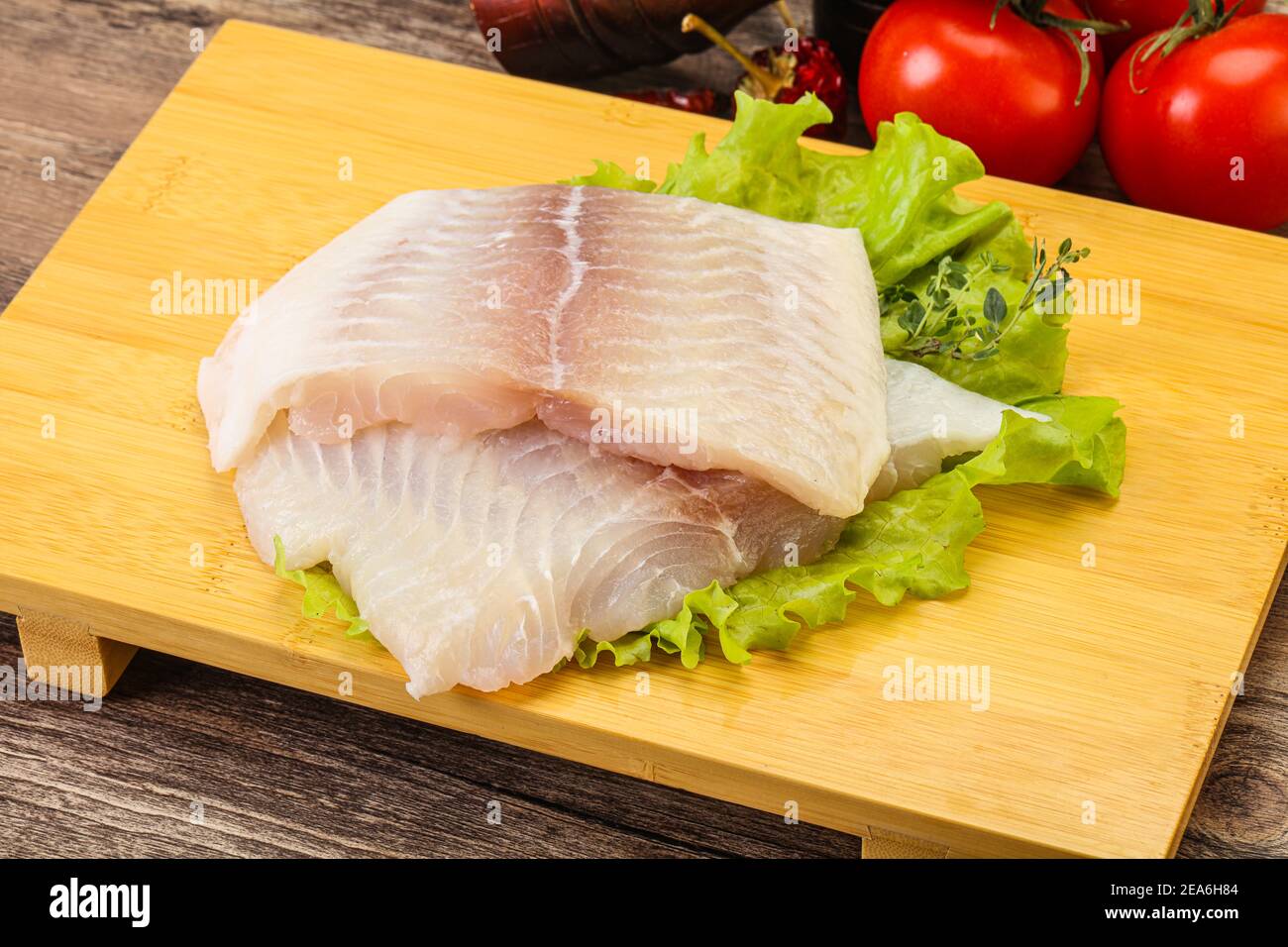 Raw pangasius fillet fish for cooking Stock Photo - Alamy